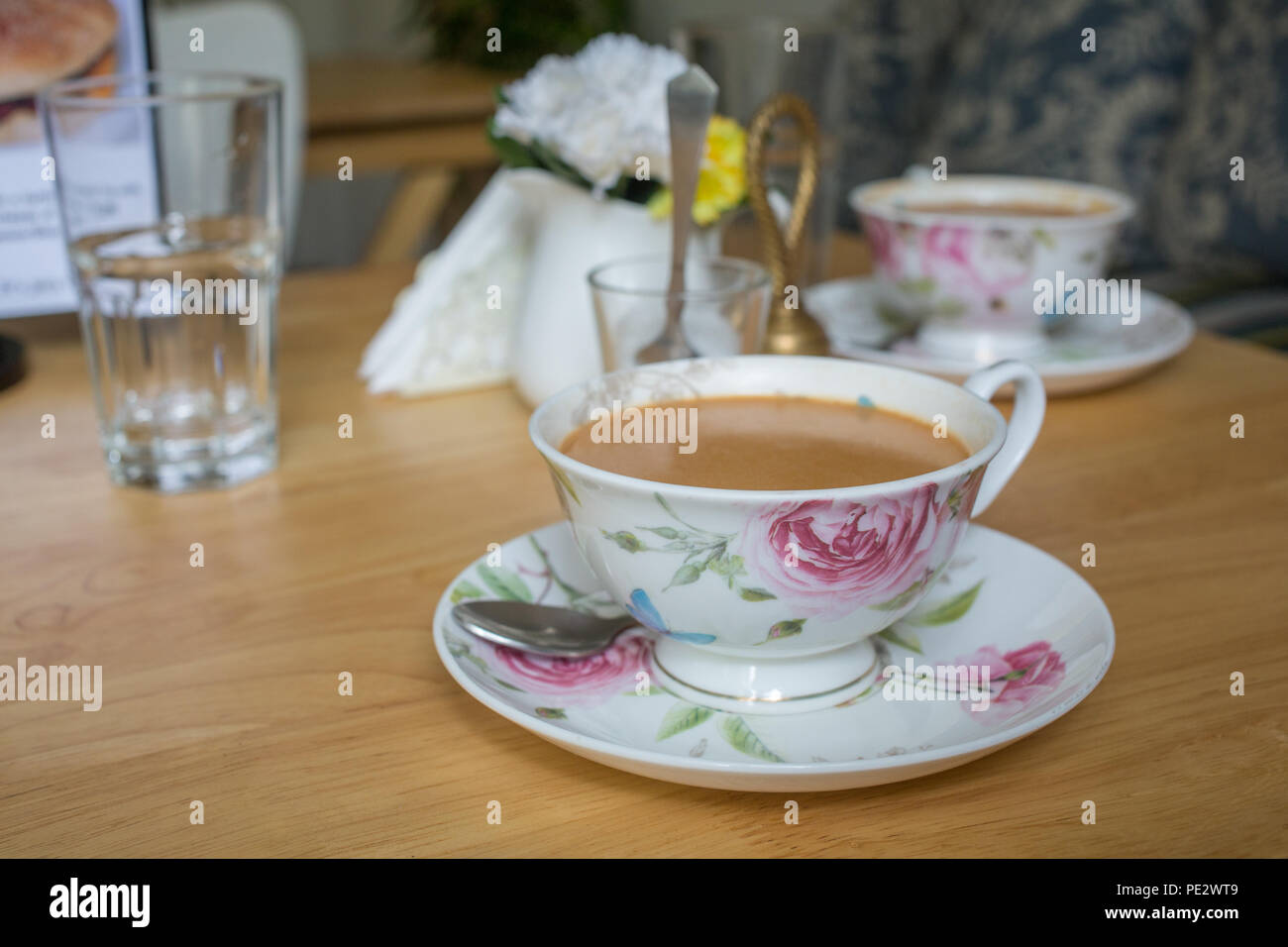 A cup of tea at a cafe Stock Photo - Alamy