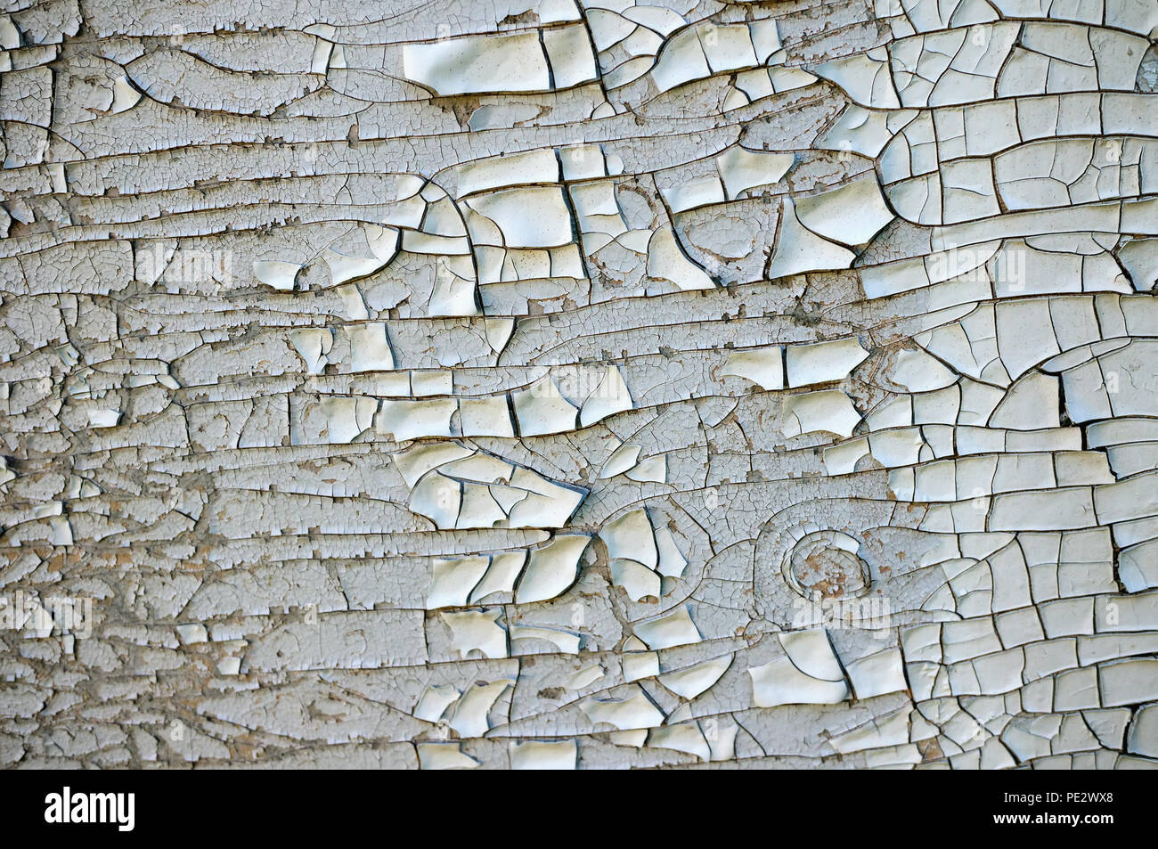 White painted cracks of old textured wall texture Stock Photo - Alamy