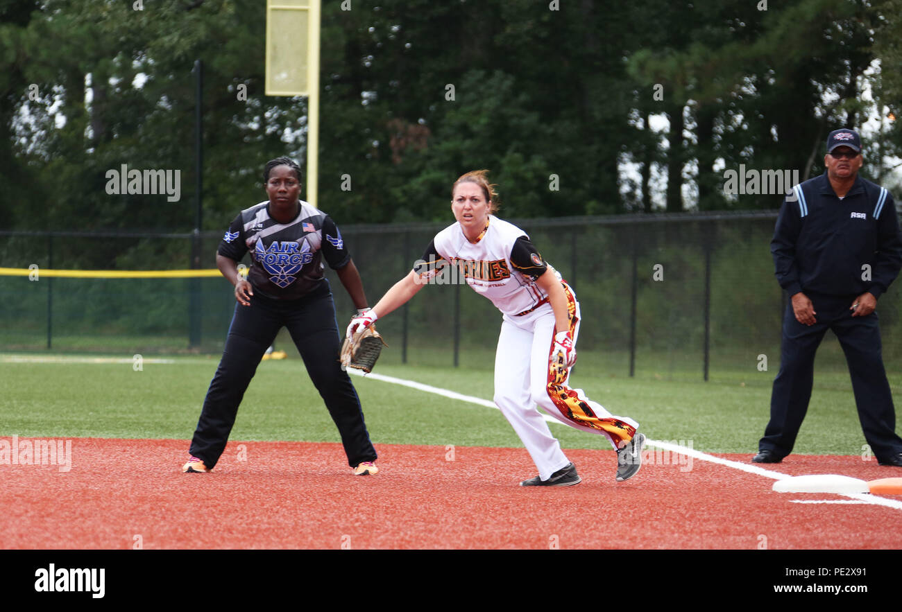 A member of the U.S. Marine Corps women’s softball team gets ready to ...