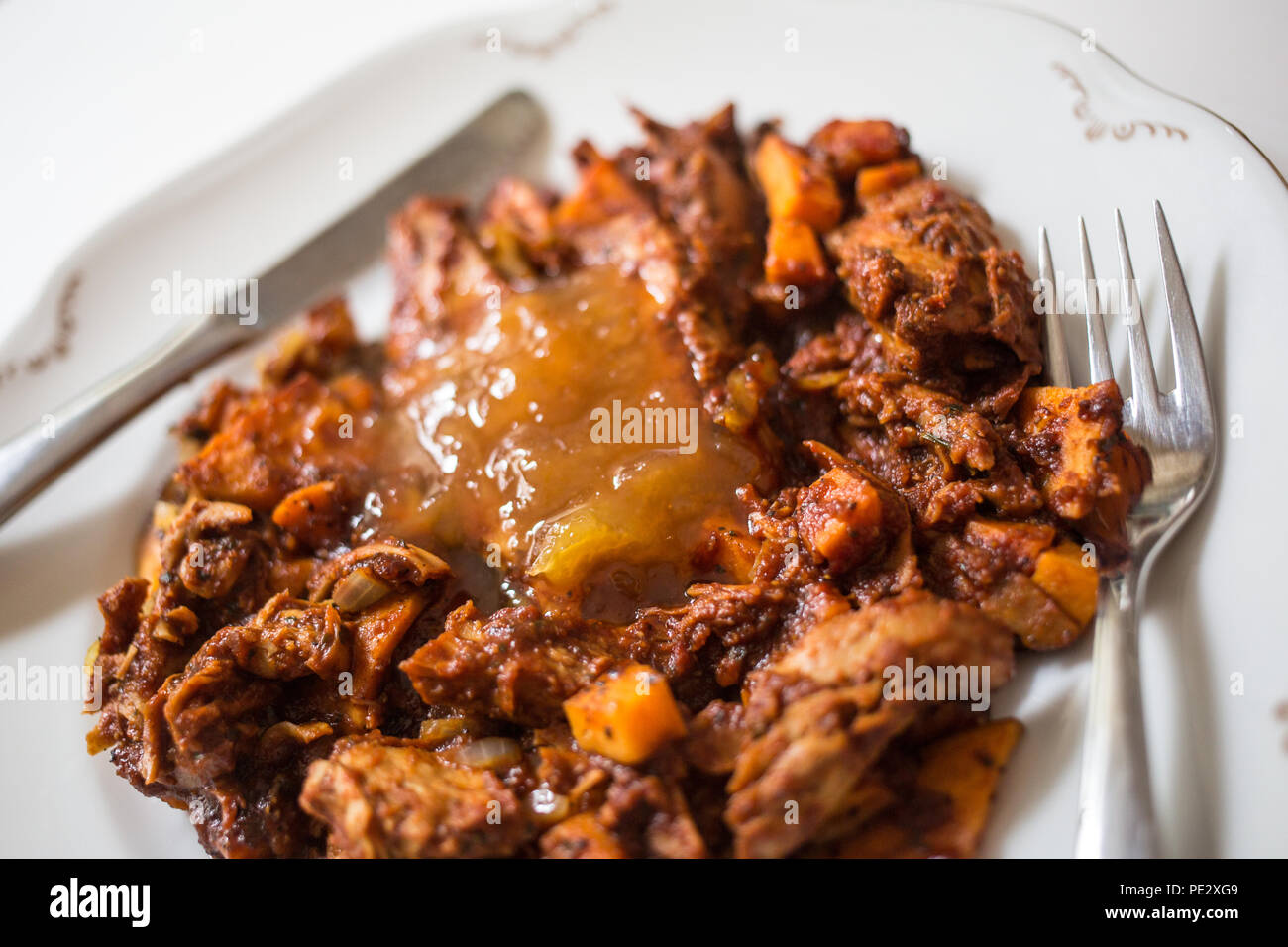 Simple vegan stew with mango chutney Stock Photo - Alamy