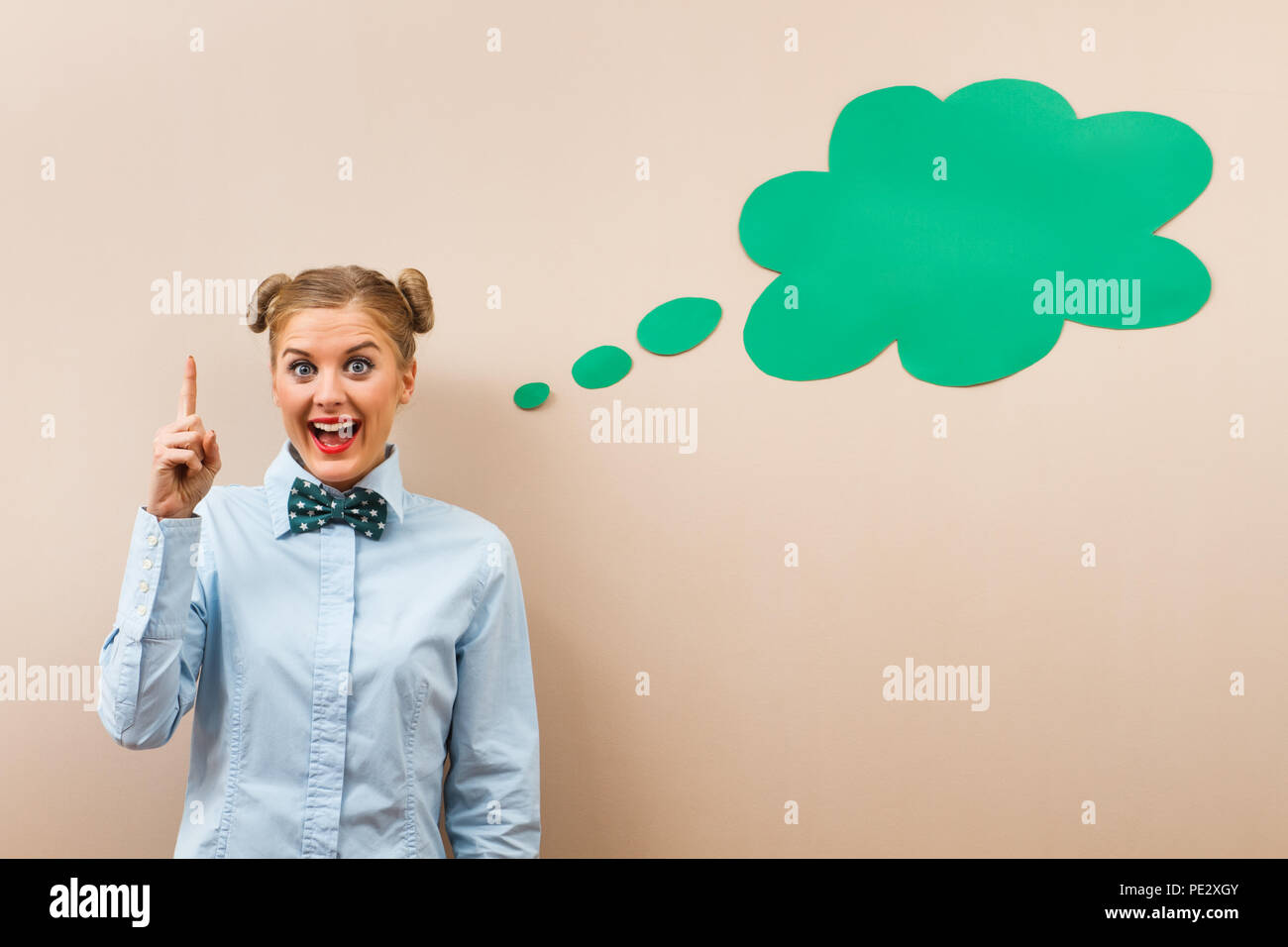 Nerdy woman having idea Stock Photo - Alamy