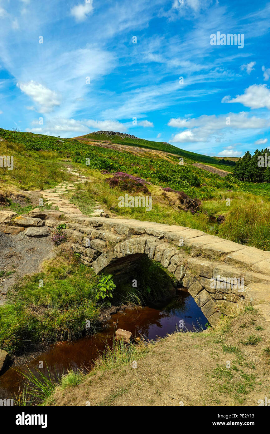 Single female walker and packhorse bridge, Burbage, Burbage Valley ...