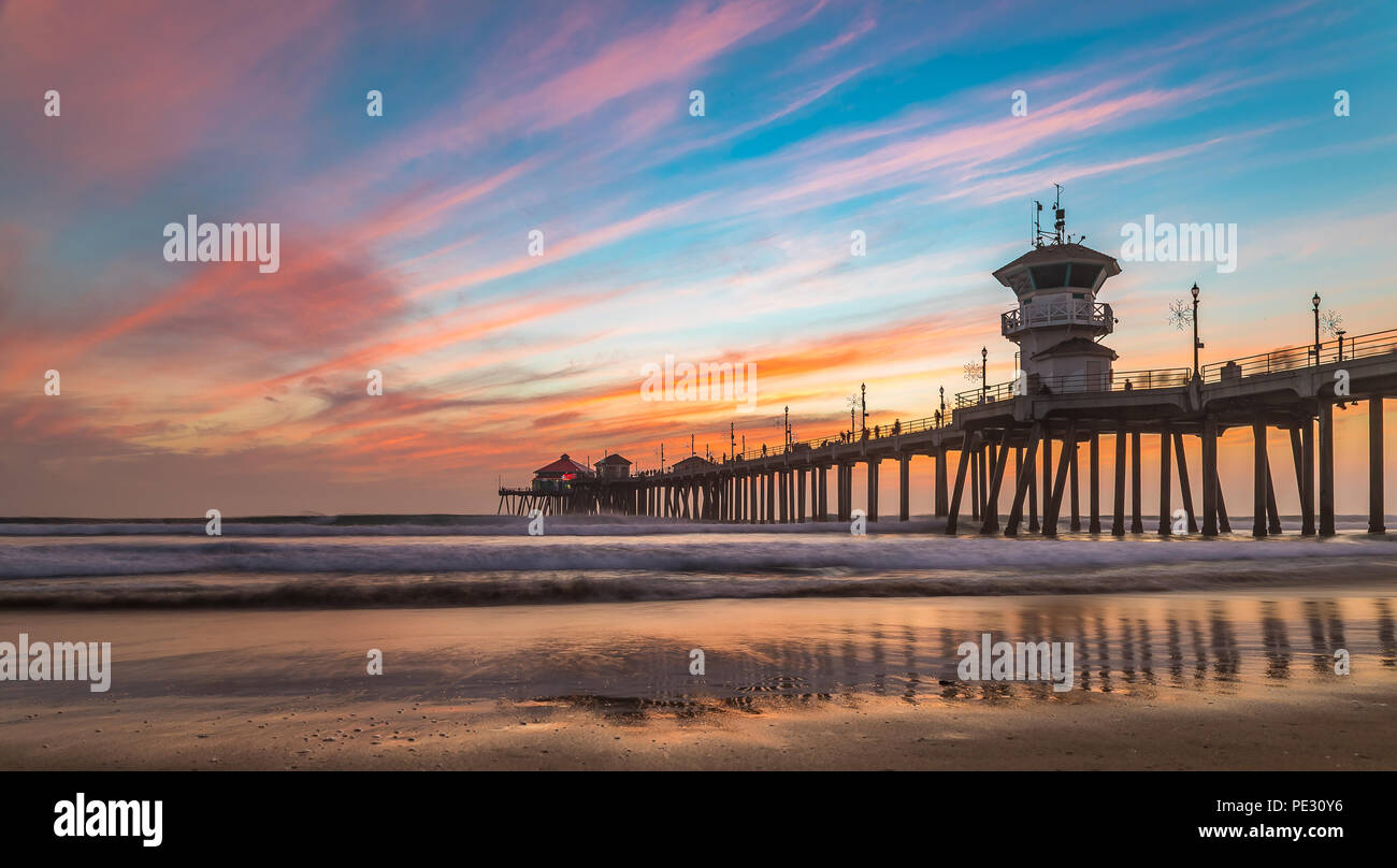 Incredible colors of sunset by Huntington Beach Pier, in the famous ...