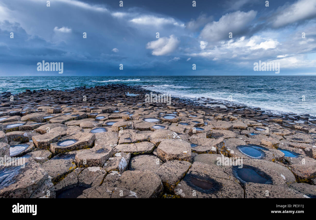 Volcanic Rock Columns of Giants Causeway under Stormy Sky, Northern ...