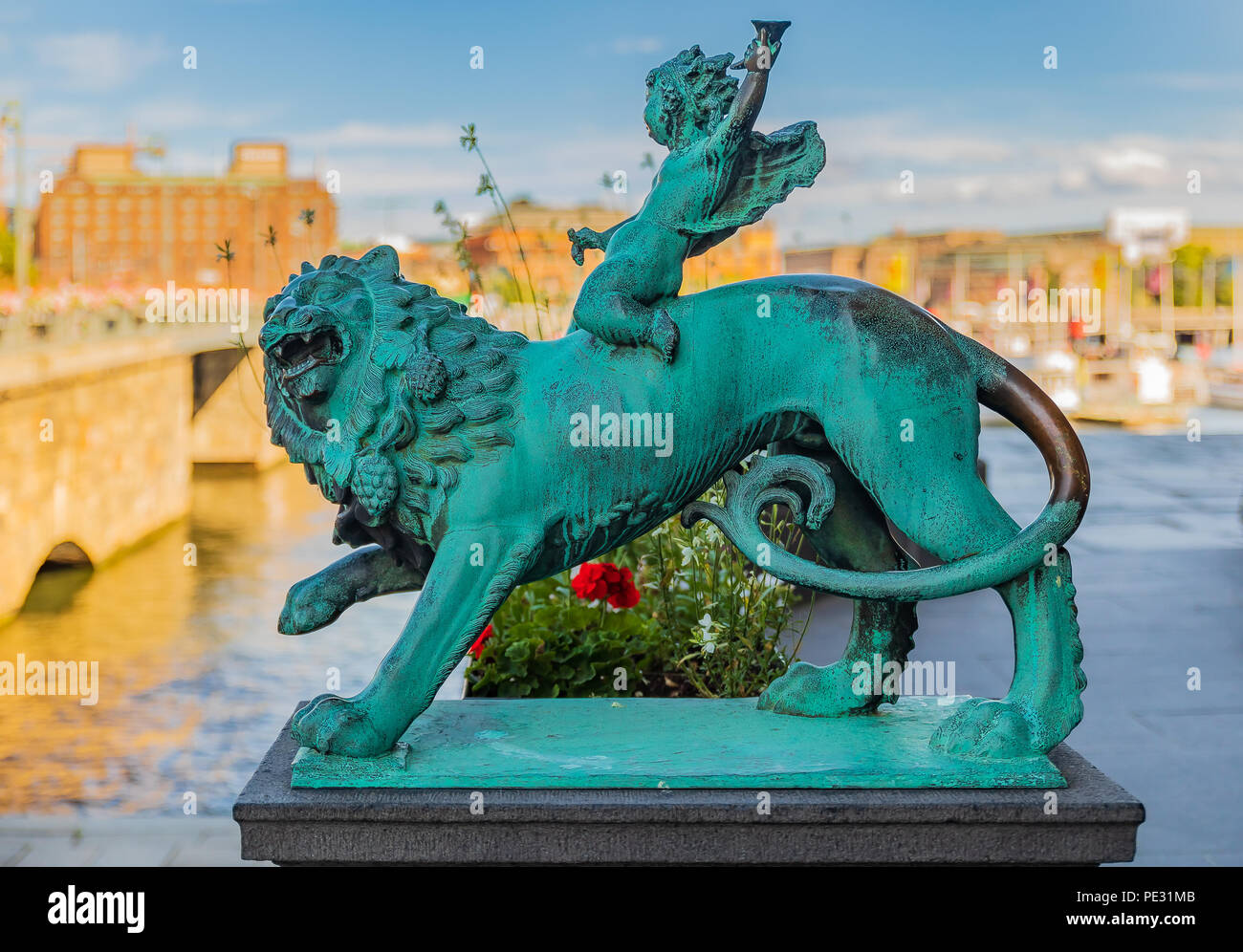 19th century statue of Bacchus riding a lion in front of the City Hall ...