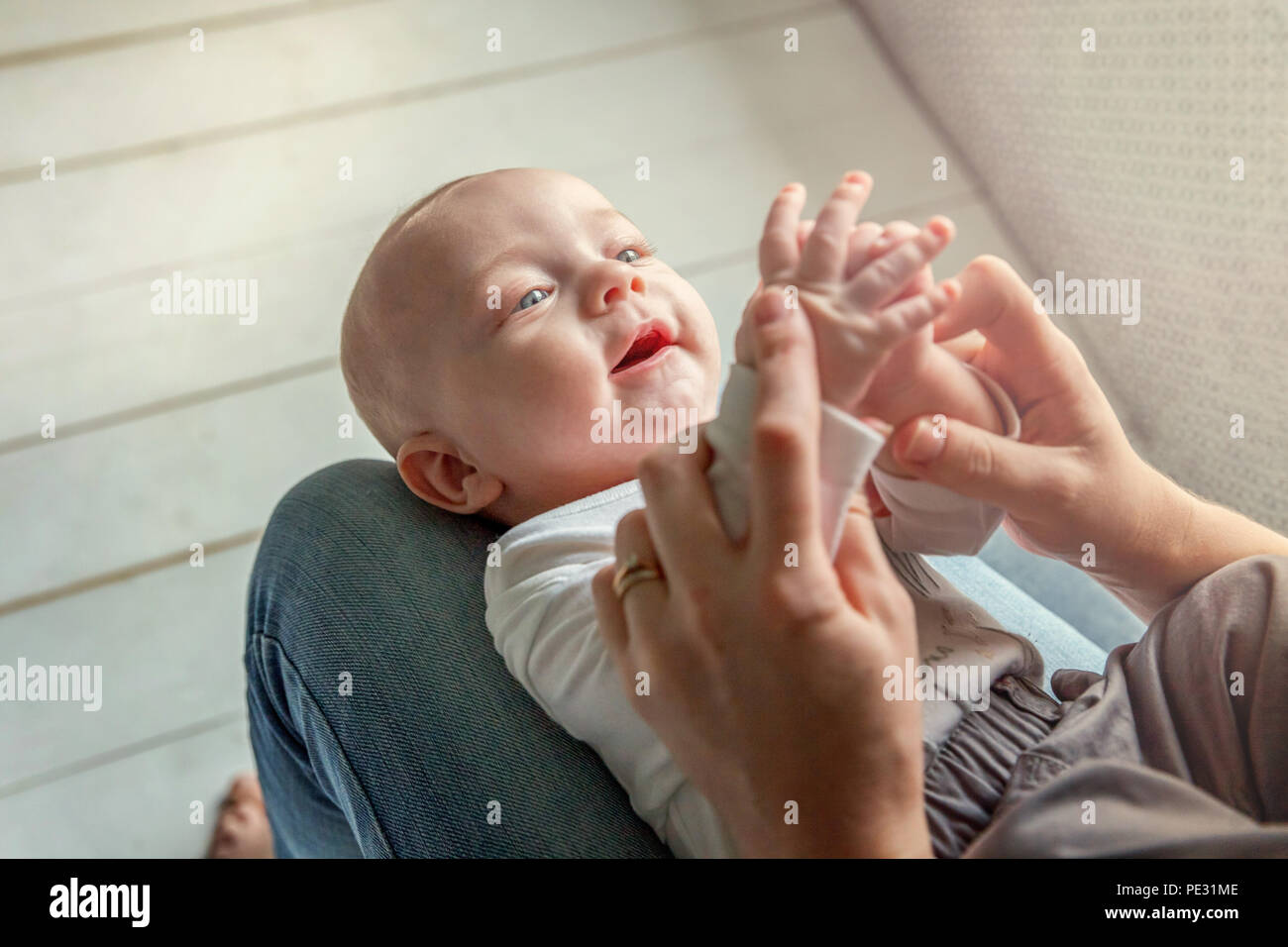 Mom Holding Son On Lap High Resolution Stock Photography and Images - Alamy