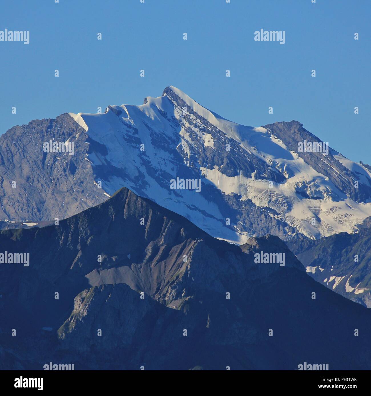 Mount Doldenhorn seen from Mount Niederhorn. High mountain in the ...