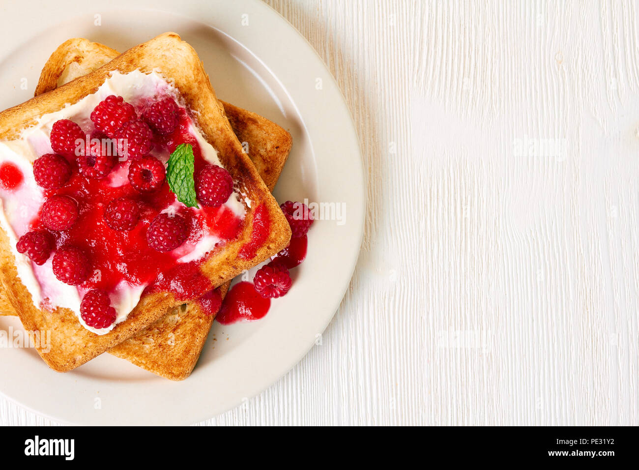 Healthy breakfast toasts with raspberry and cottage cheese Stock Photo ...