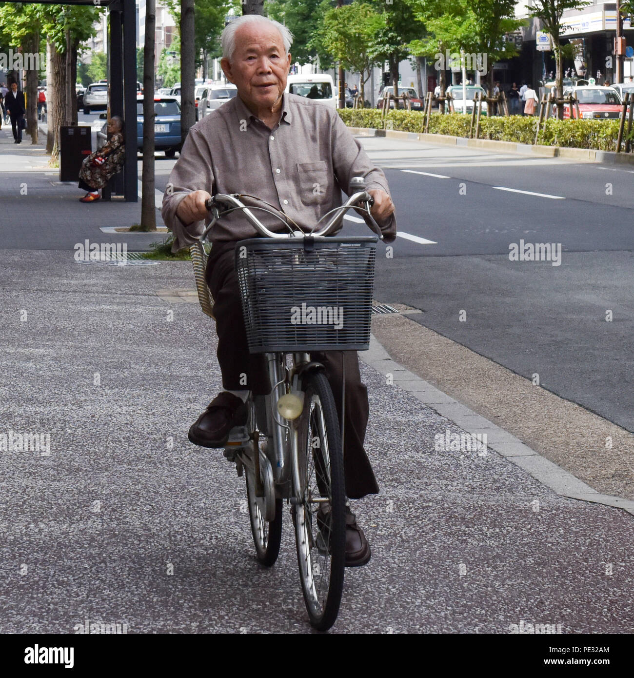 Japan senior on bicycle hi-res stock photography and images - Alamy