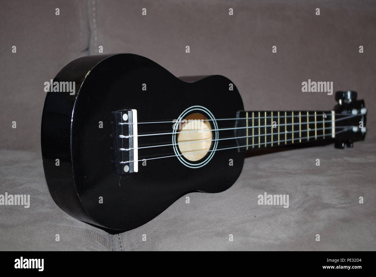 Ukulele chords hi-res stock photography and images - Alamy