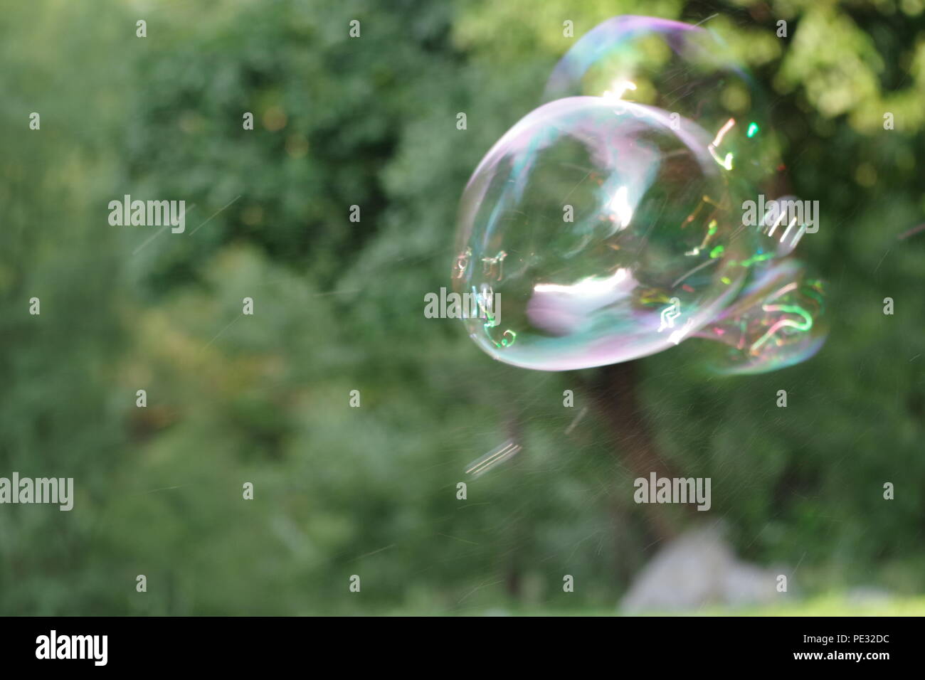 bursting bubble in the wind Stock Photo - Alamy