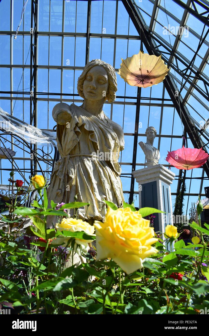 Statue on flower Stock Photo - Alamy