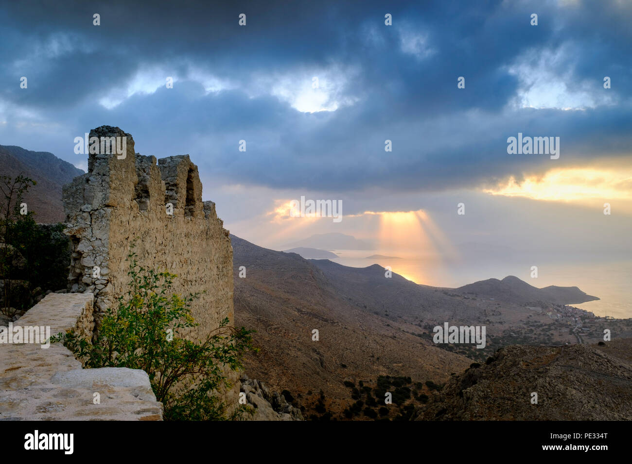 Sun rays over the bay seen from the medieval castle of Halki Stock ...