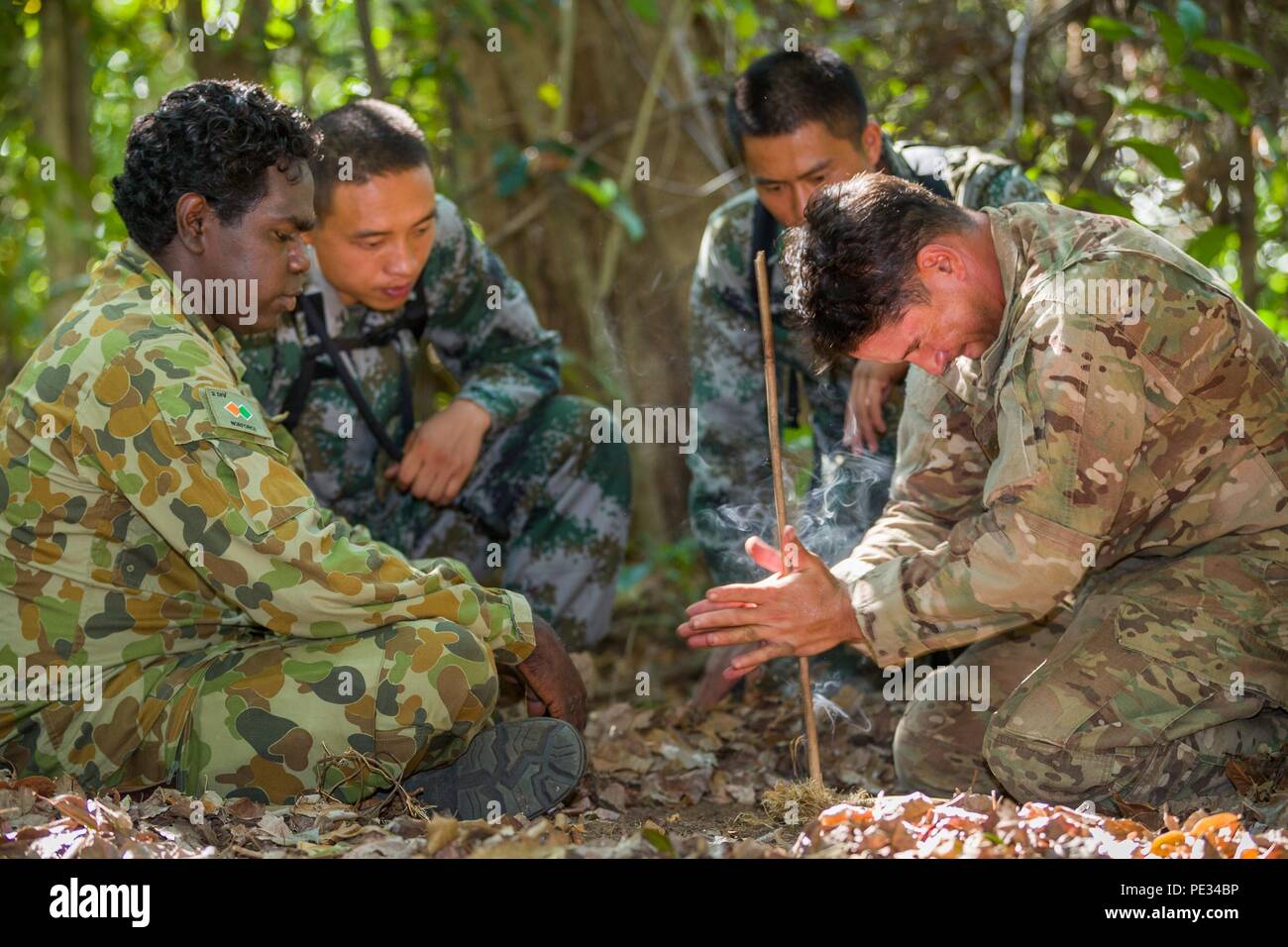 Australian Army soldier Lance Corporal Vinnie Rami (left) guides U.S ...