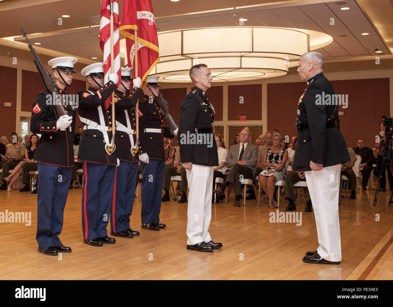 U.S. Marine Corps Gen. John M. Paxton, right, assistant commandant of ...