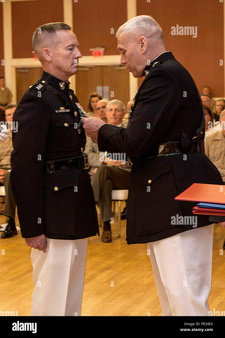 U.S. Marine Corps Gen. John M. Paxton, right, assistant commandant of ...