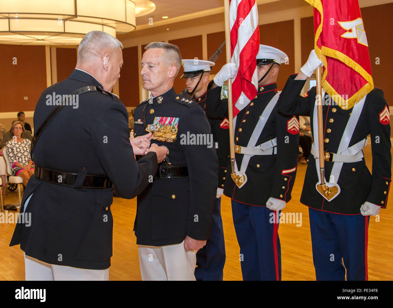 U.S. Marine Corps Gen. John M. Paxton, left, assistant commandant of ...