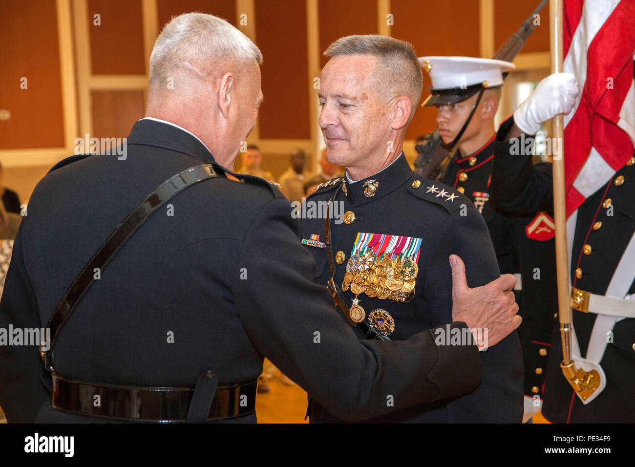 U.S. Marine Corps Gen. John M. Paxton, left, assistant commandant of ...