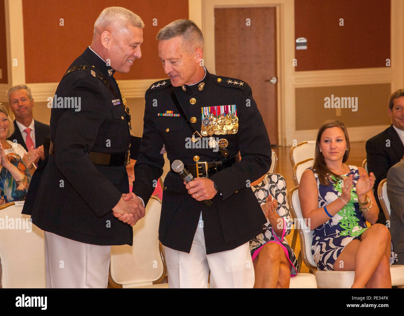 U.S. Marine Corps Gen. John M. Paxton, left, assistant commandant of ...