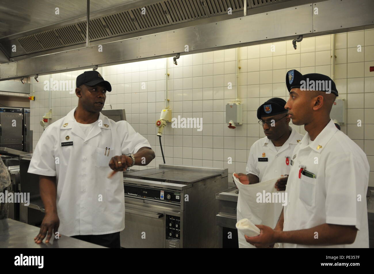 Pvt. Justin Quintana, 421st Multifunctional Medical Battalion, drains ...