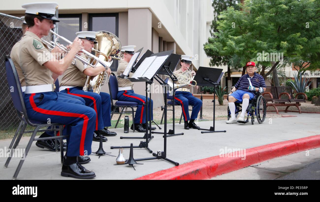 1st Sgt. Cecilio Vallejoi, USMC (Ret), listens to Marine musicians ...