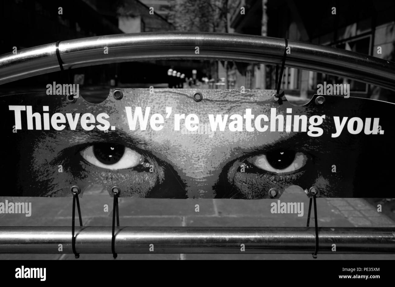 Warning to thieves sign Black and White Stock Photos & Images - Alamy