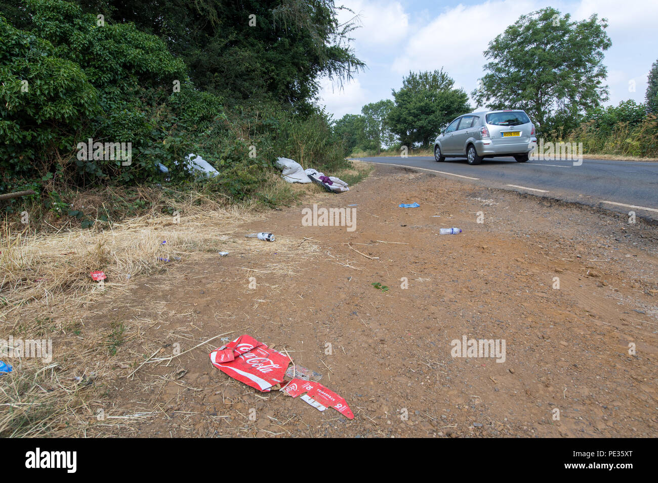 Rubbish in a layby next to a busy main road. Cotswolds, UK Stock Photo ...