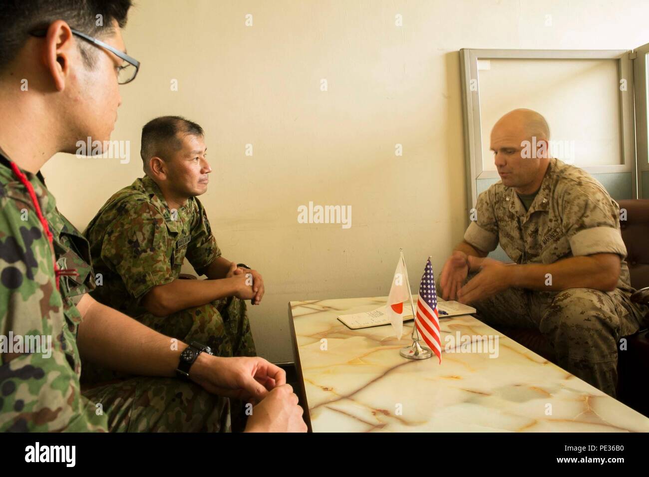 Col. Tadisha Tanida, Left, discusses plans with Lt. Col. Eric Reid ...