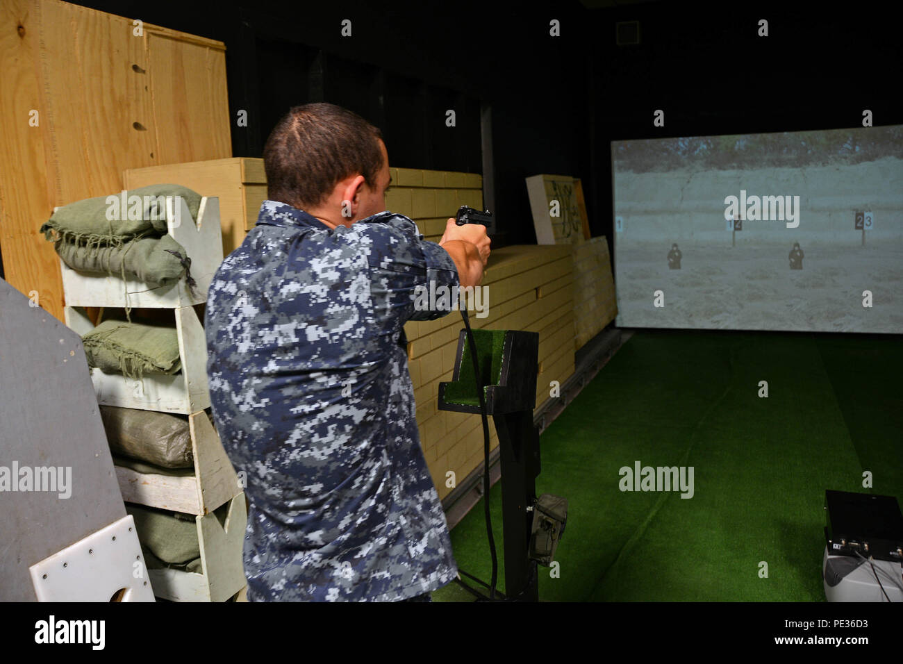 U.S. Navy Sailors assigned to USS Mount Whitney (LCC-20) engage targets ...