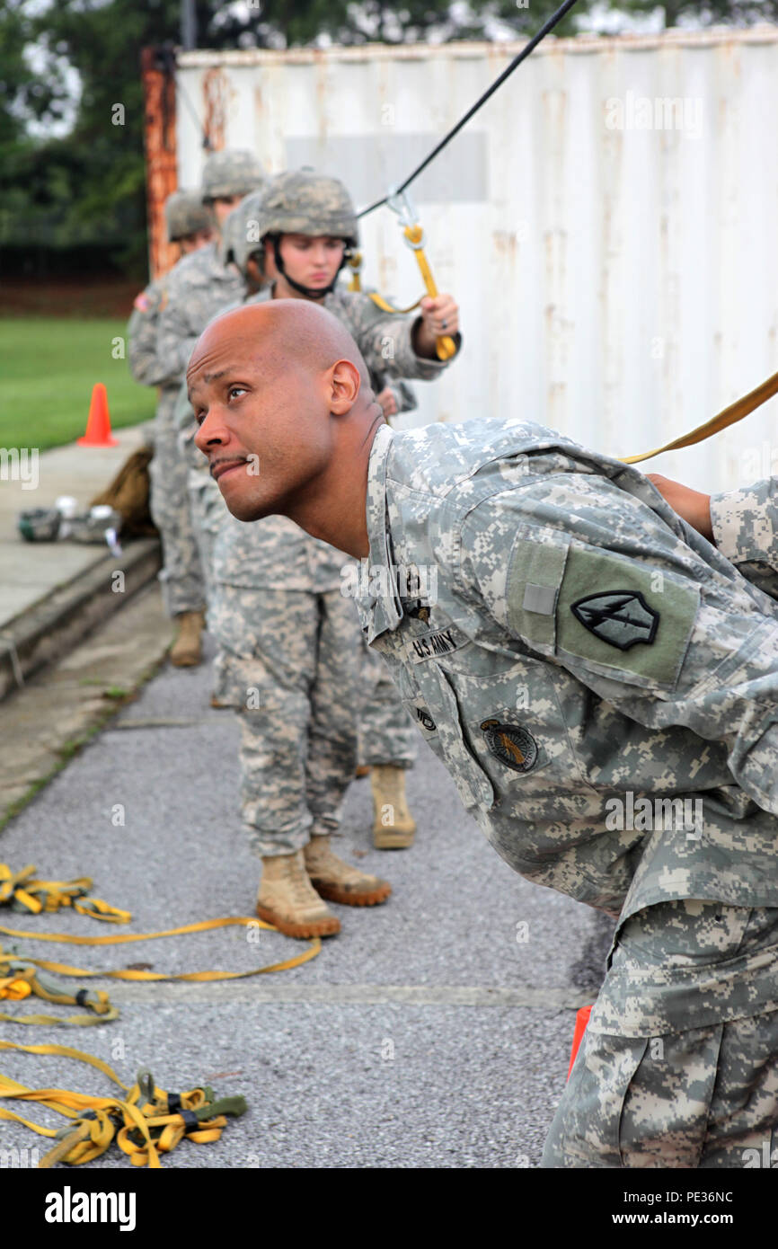 U.S. Army Sgt. 1st Class Derrick Caple, 165th QM Company, simulates ...