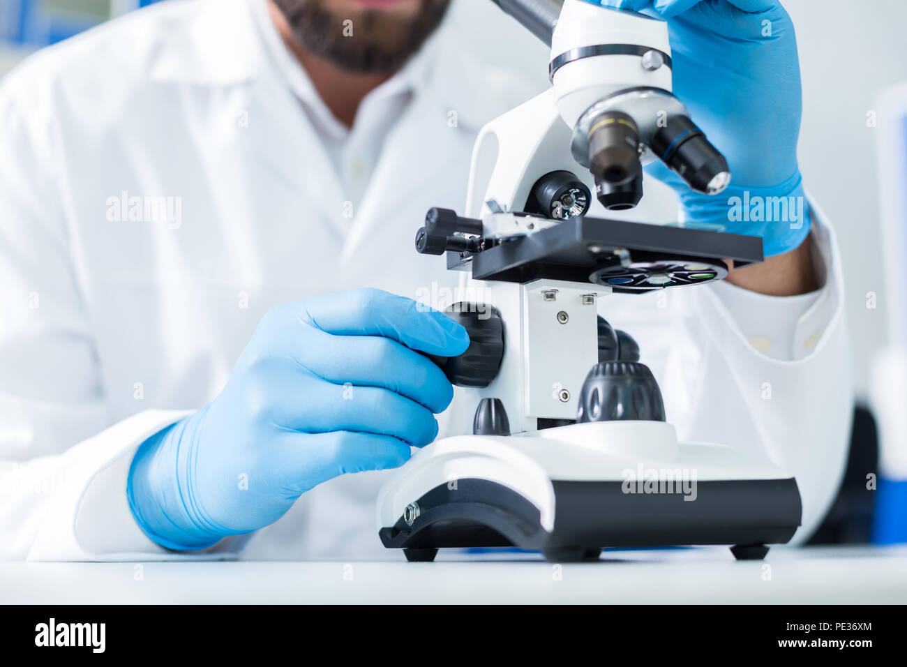 Laboratory equipment. Close up of a professional microscope being used ...
