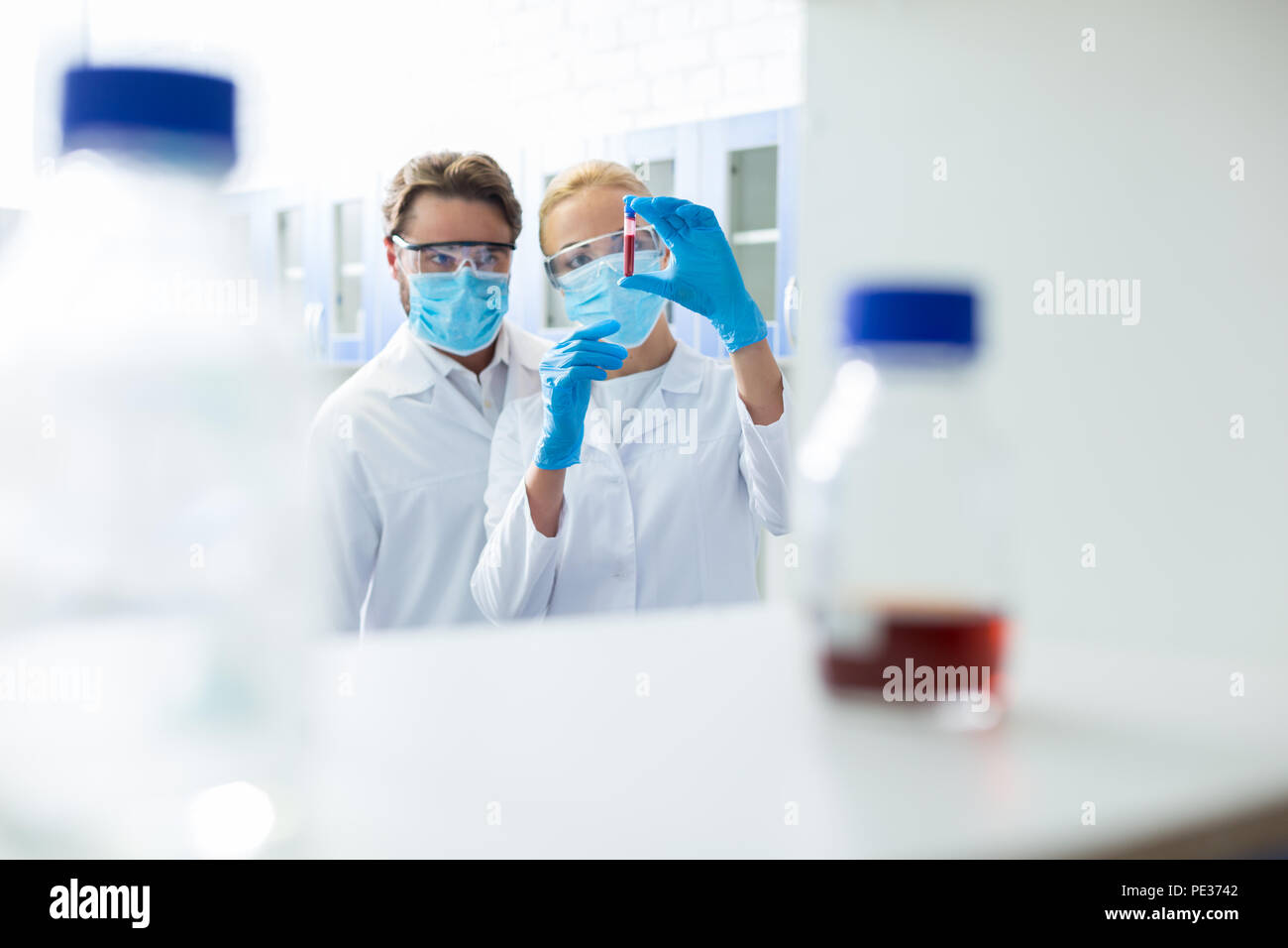 Smart scientists hi-res stock photography and images - Alamy