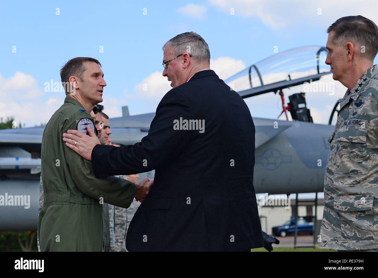 Robert Work, U.S. deputy secretary of defense, greets Col. Scottie ...