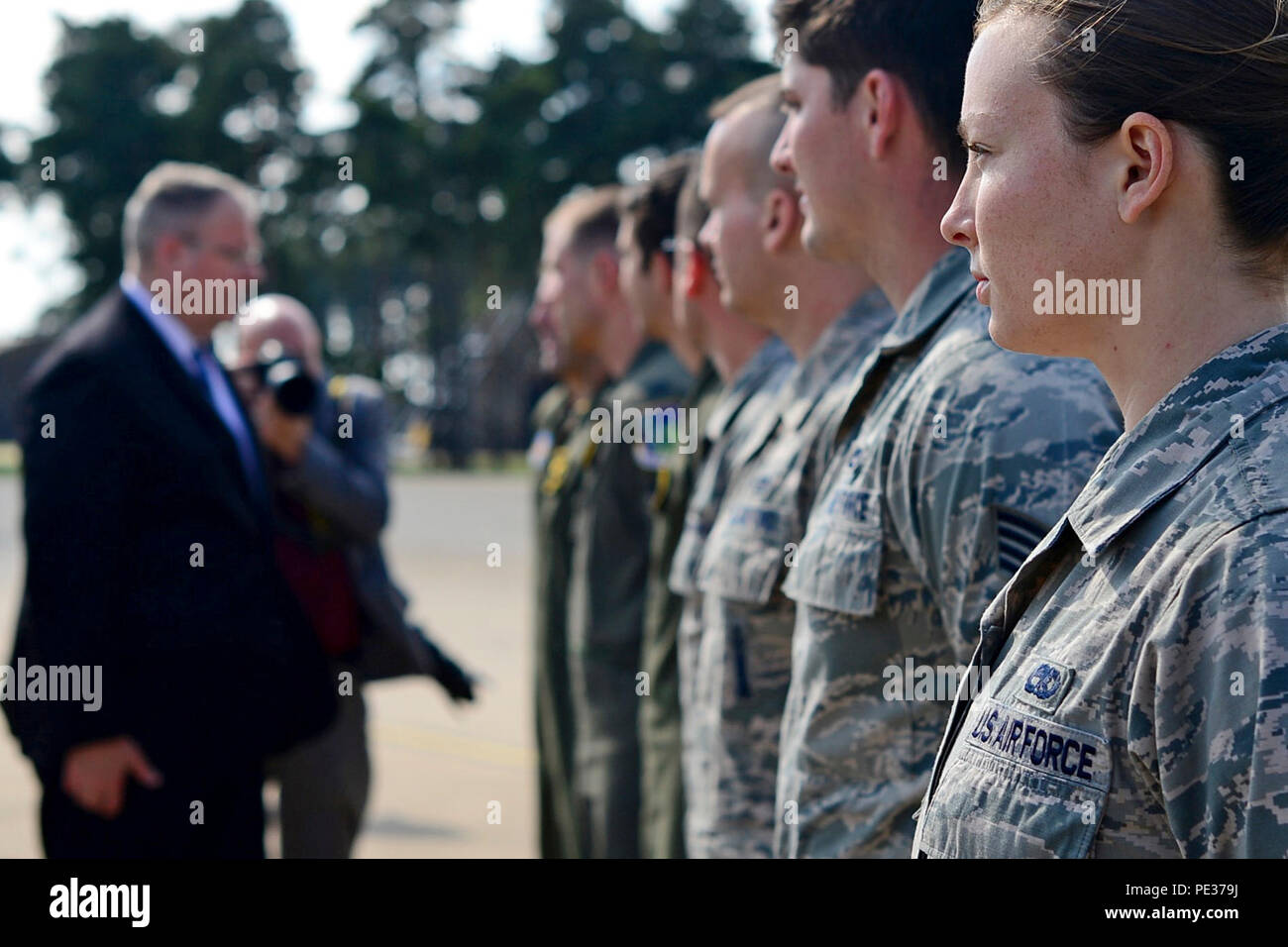 Robert Work, U.S. deputy secretary of defense, prepares to coin Airmen ...