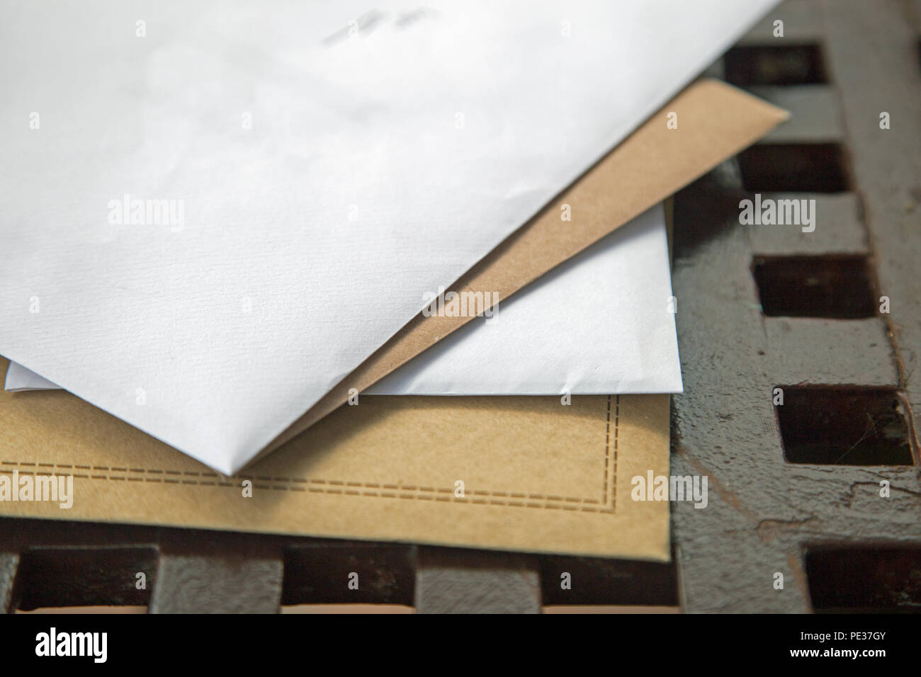Four birthday card envelopes splayed out on a table Stock Photo - Alamy