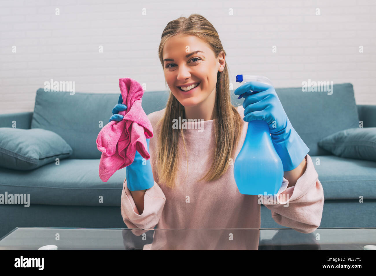 Beautiful blond woman cleaning house hi-res stock photography and ...