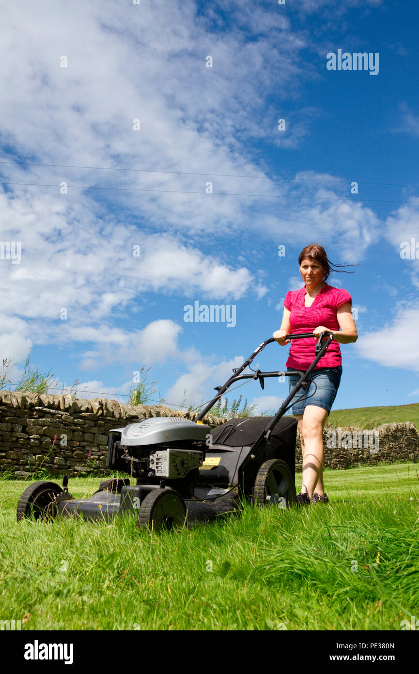 Lawn mower girl hi-res stock photography and images - Alamy