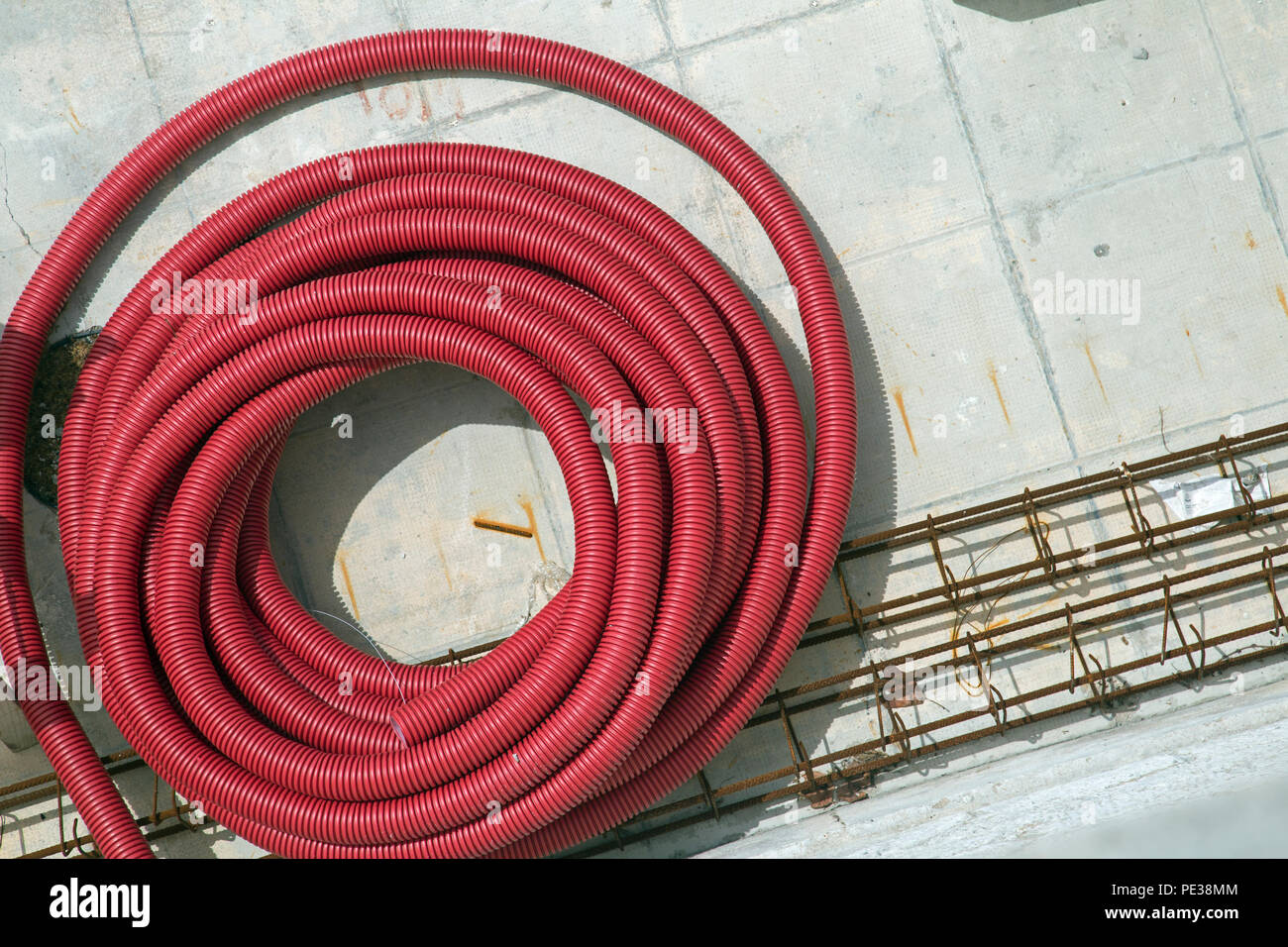 Coiled hosepipe hi-res stock photography and images - Alamy