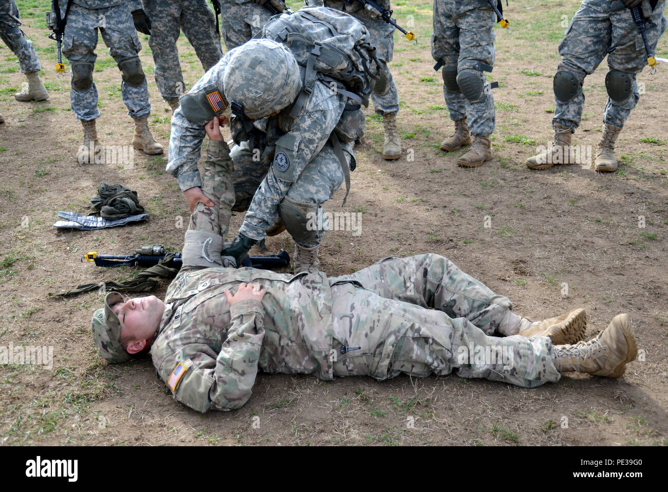 U.S. troopers with 2nd Cavalry Regiment, perform first aid for a ...