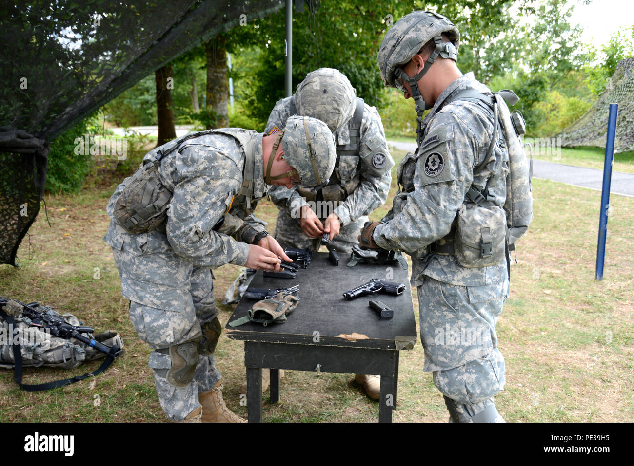 U.S. troopers assigned to 2nd Cavalry Regiment assemble and disassemble ...