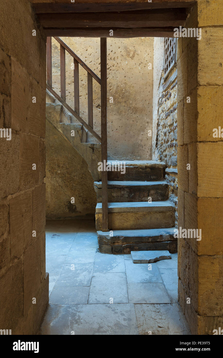 Ancient external old bricks stone wall and doorway revealing a stone ...