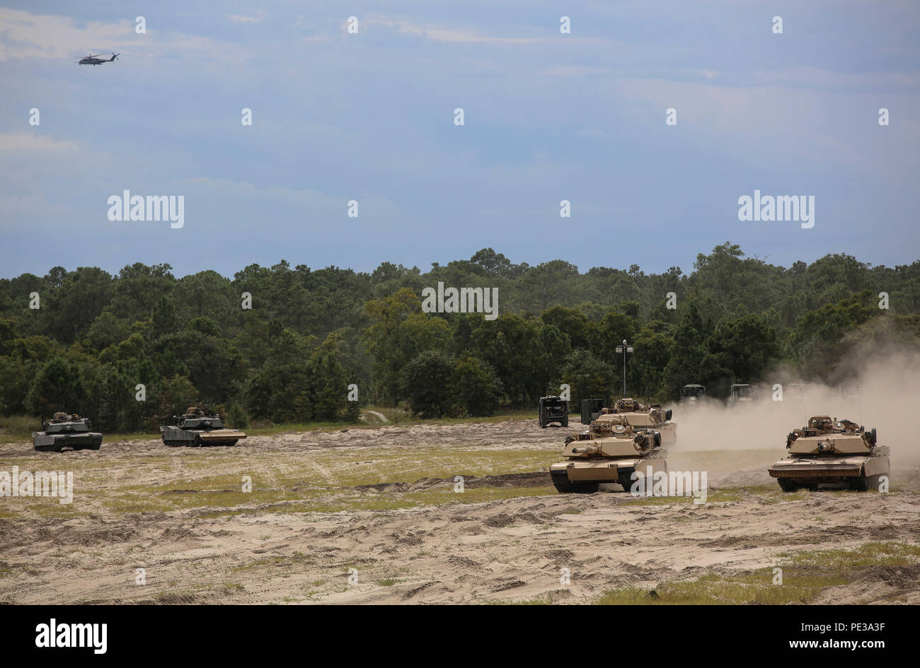 Marines with Alpha Company, 2nd Tank Battalion, use M1 Abrams tanks to ...