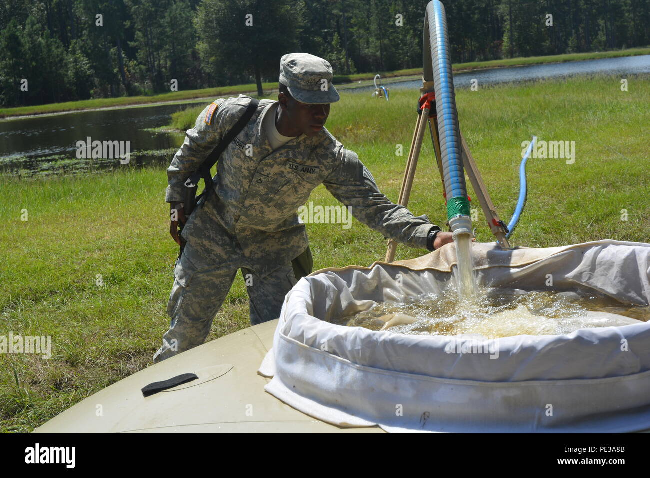 Pfc. Terrence Garden, a water treatment specialist assigned to 226th ...