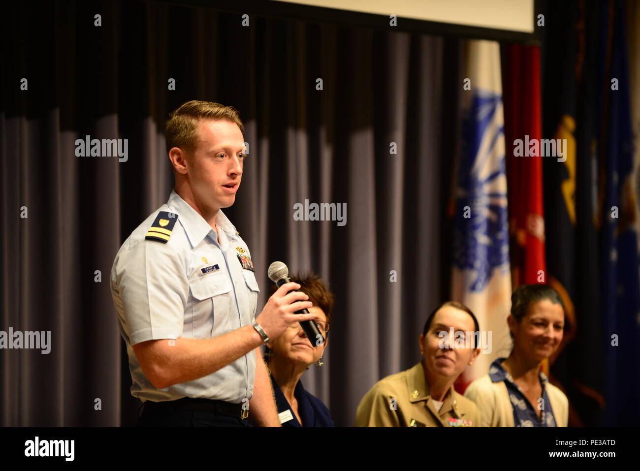 Lt. Joshua Schwartz, far left, commanding officer of the Coast Guard ...