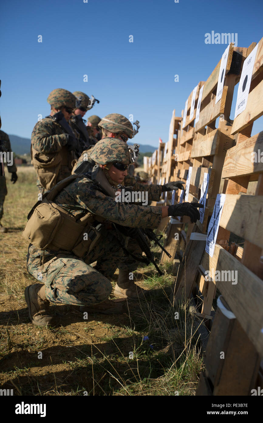 U.S. Marines with Combined Arms Company observe their targets during a ...