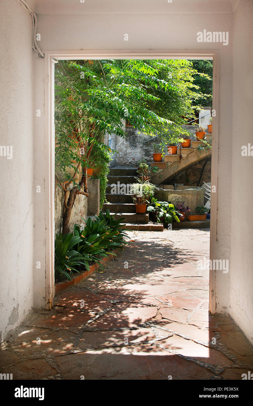 Andalusian patio in Cordova with some clay flower pots. Travel ...