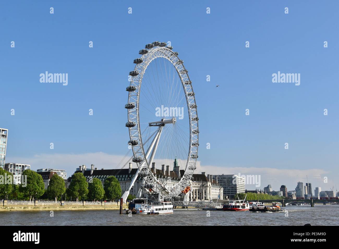 The iconic London Eye Observation Wheel along the River Thames, London ...