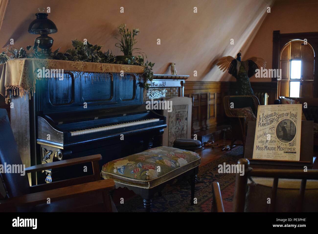 Vintage piano room in the castle Stock Photo - Alamy