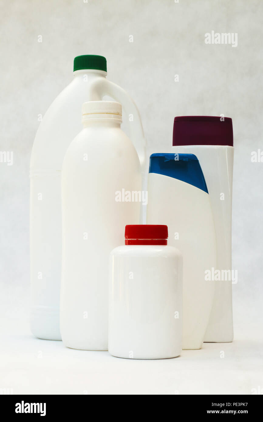 Plastic containers of different shapes and colors Stock Photo - Alamy