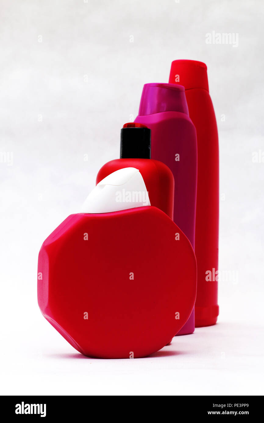 Plastic containers of different shapes and colors Stock Photo - Alamy